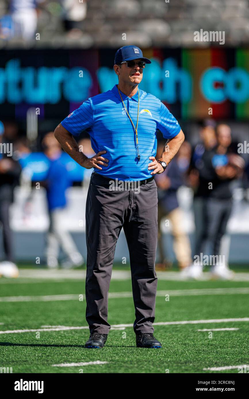 Los Angeles Chargers head coach Jim Harbaugh watches warm ups before an NFL football game ...