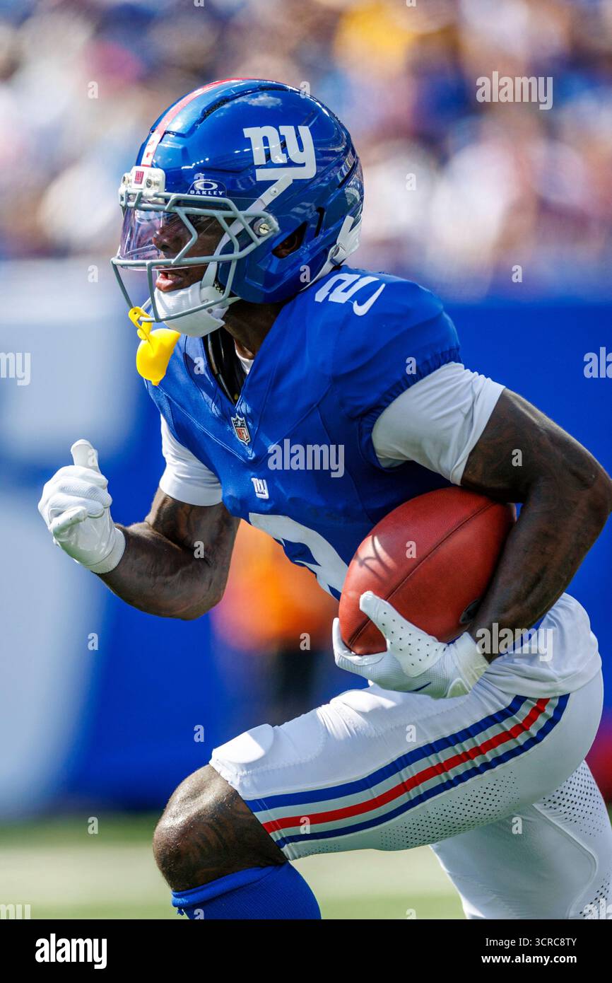 New York Giants cornerback Deonte Banks (2) runs a kickoff during an NFL football game against ...