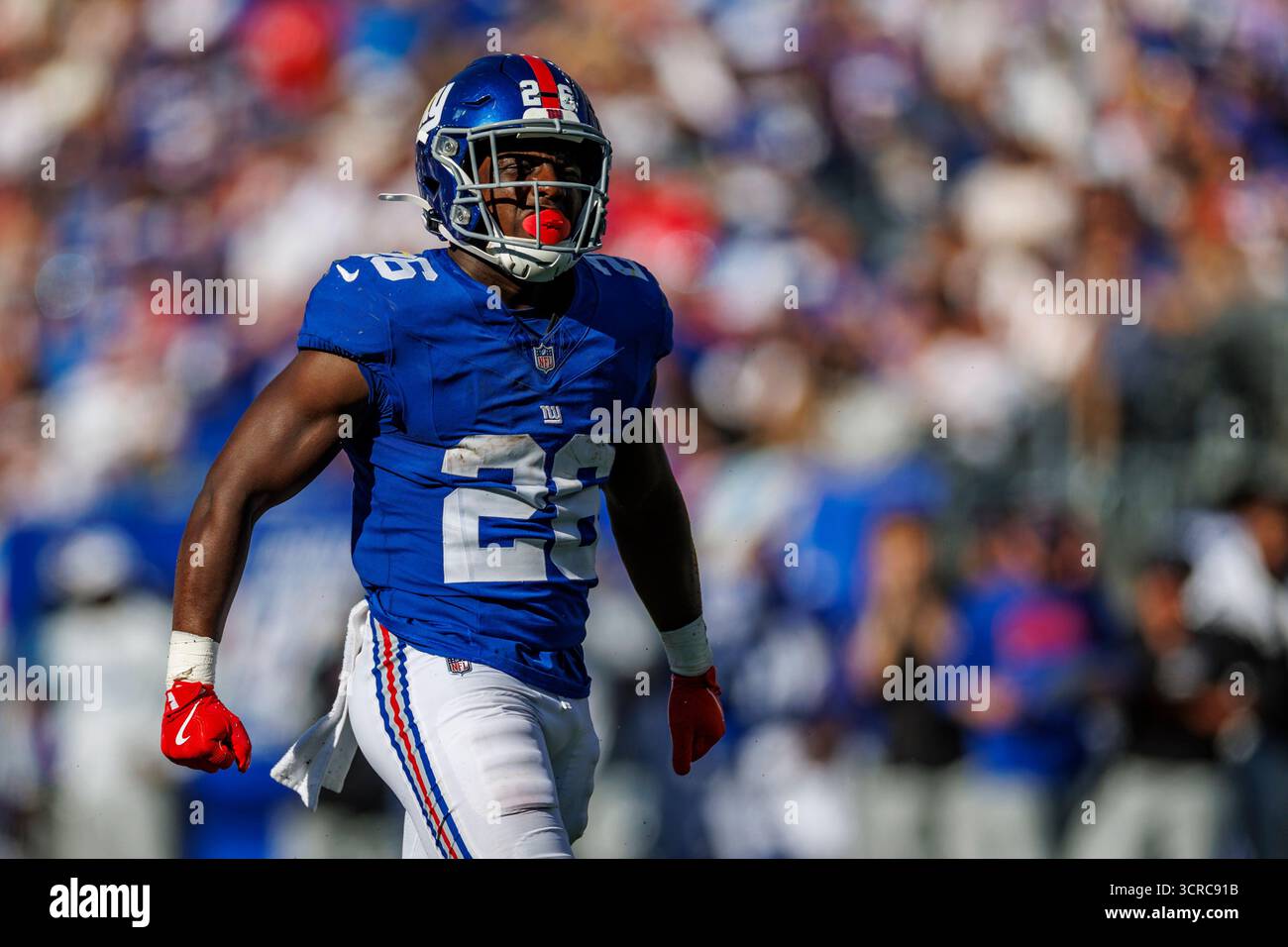 New York Giants running back Devin Singletary (26) celebrates a run ...