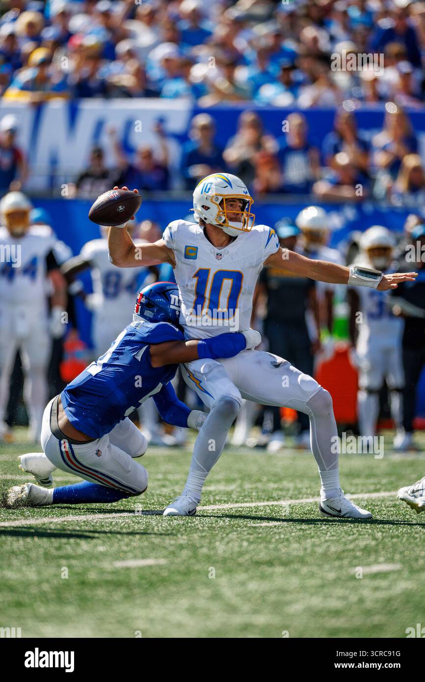 New York Giants linebacker Abdul Carter (51) puts pressure on Los Angeles Chargers quarterback ...