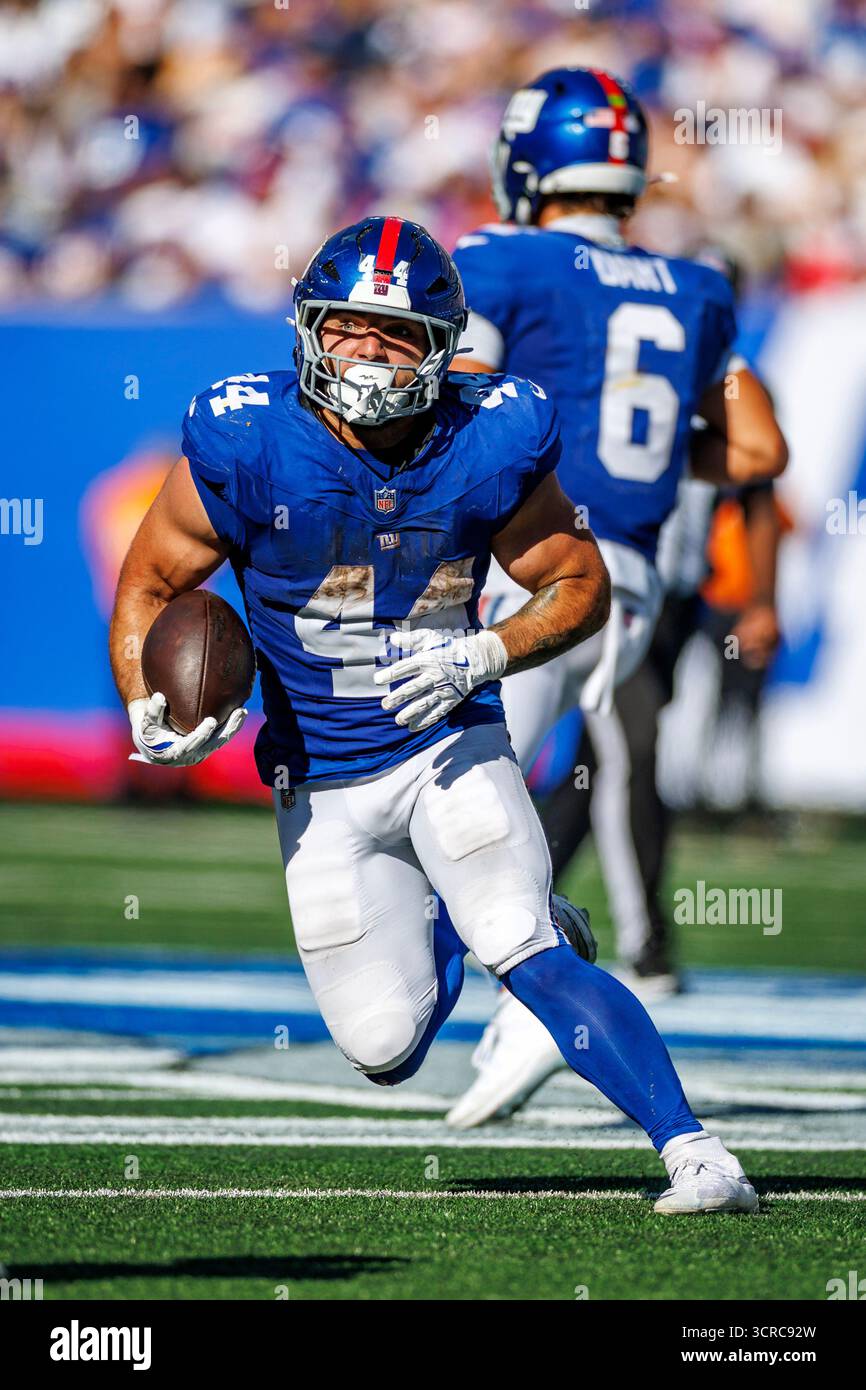 New York Giants running back Cam Skattebo (44) runs the ball during an NFL football game against ...