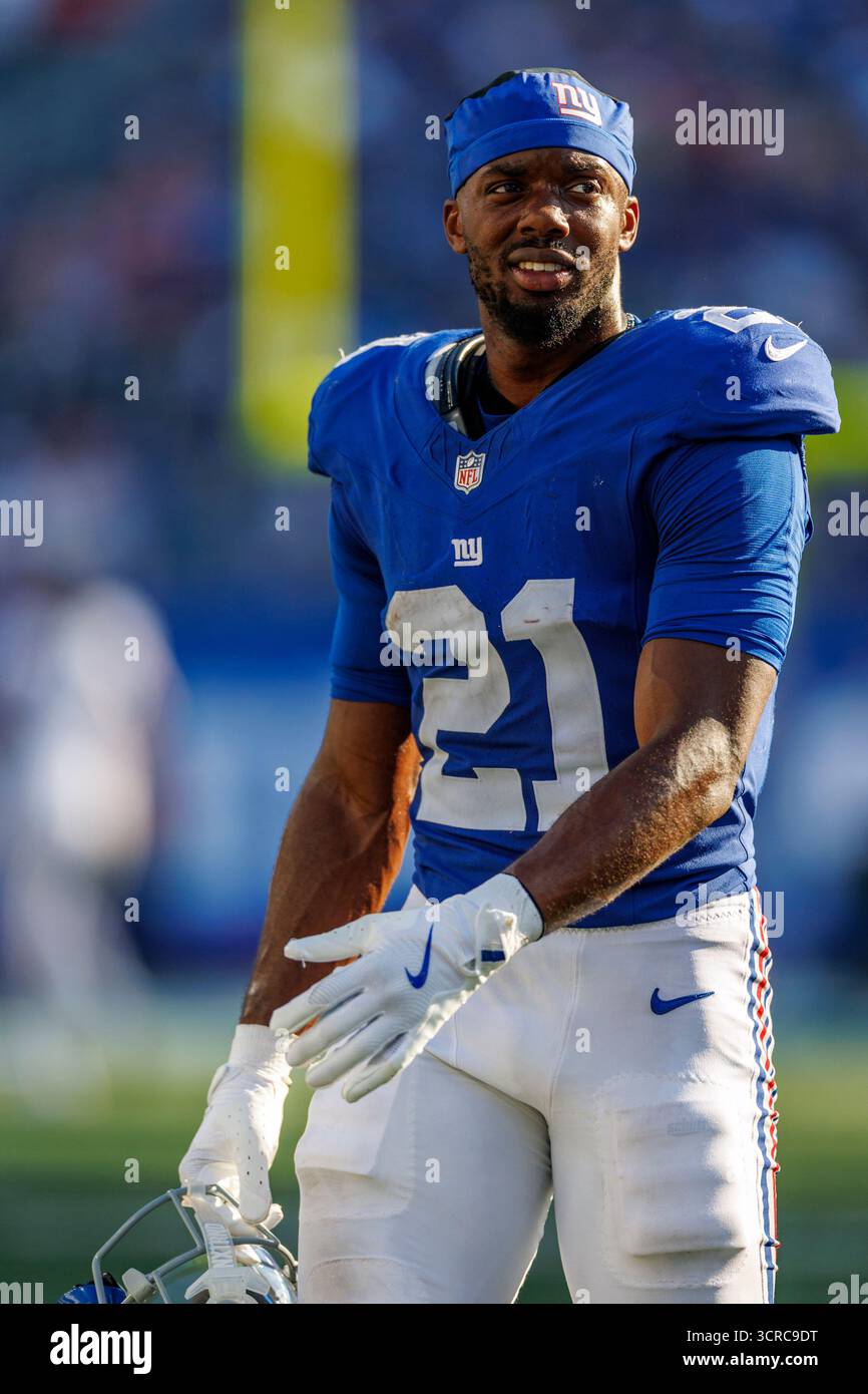 New York Giants cornerback Paulson Adebo (21)walks off the field ...