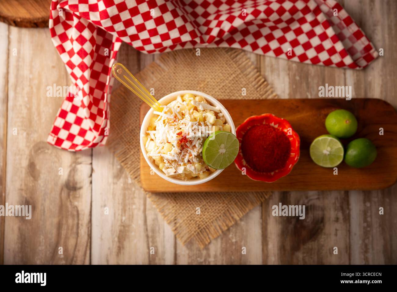 Esquites. Corn kernels cooked and served with mayo, sour cream, lemon ...