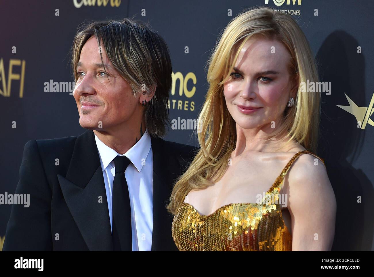 FILE - Keith Urban, left, and Nicole Kidman arrive at the 49th AFI Life ...