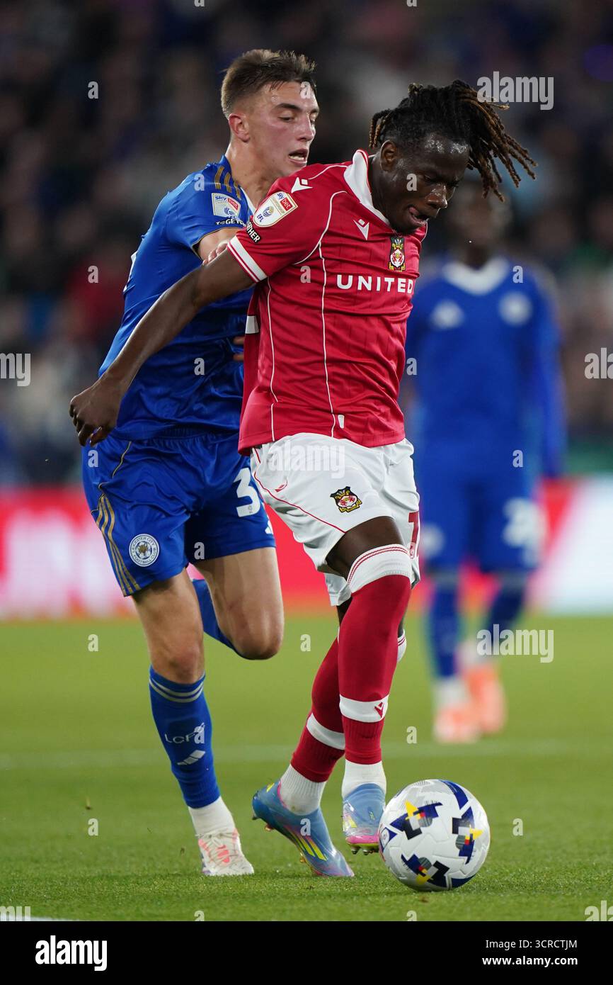 Leicester City's Luke Thomas and Wrexham's Issa Kabore battle for the ...