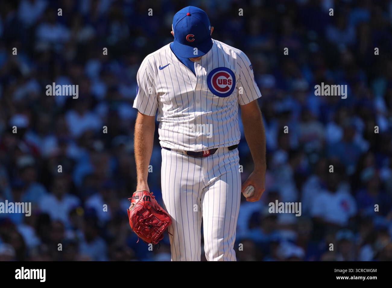 Chicago Cubs pitcher Matthew Boyd looks down during the second inning ...