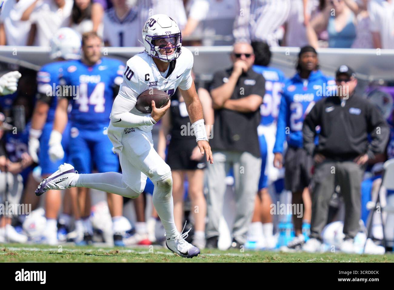 TCU quarterback Josh Hoover runs the ball against SMU during an NCAA ...