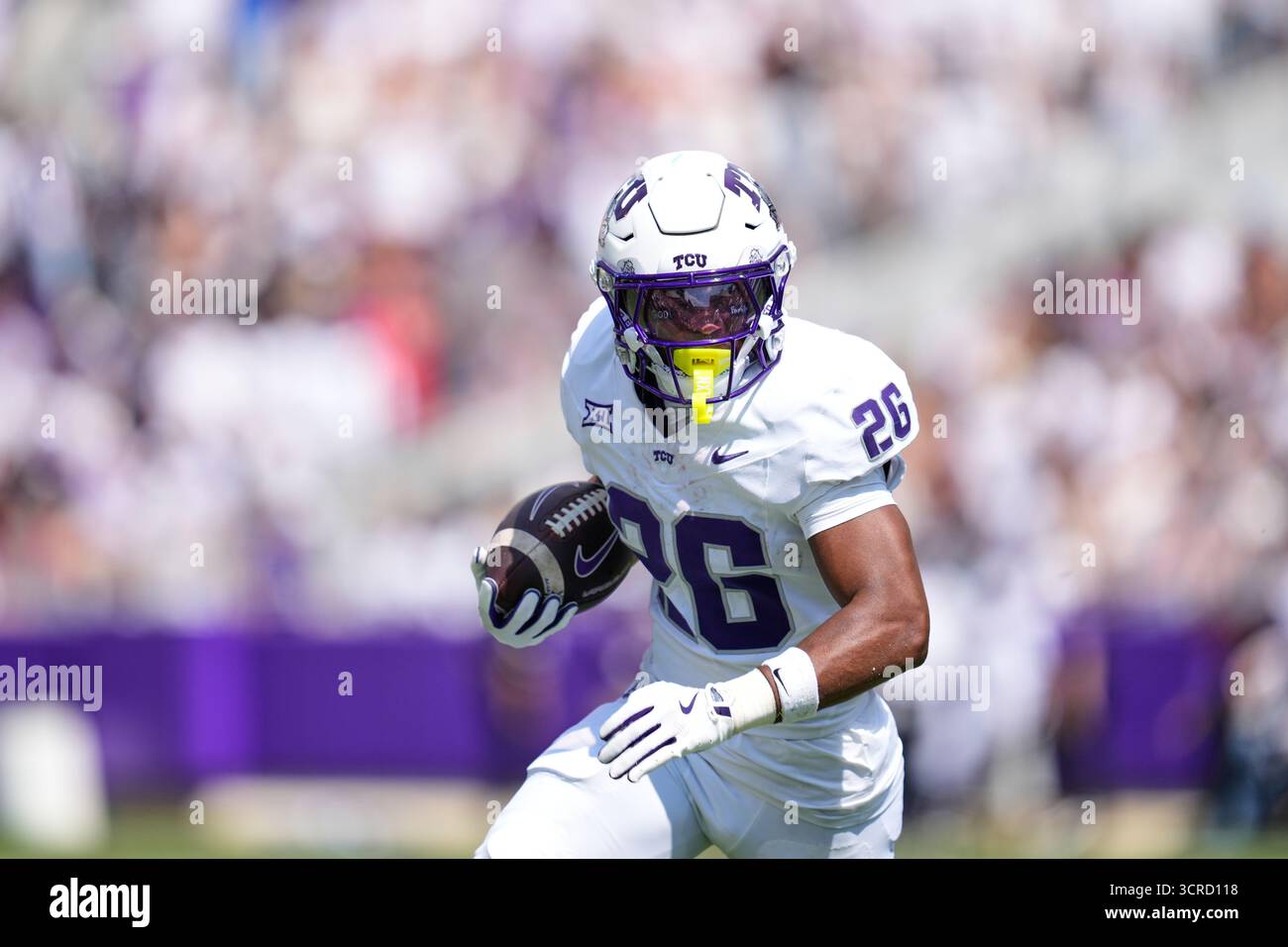 TCU running back Jeremy Payne carries the ball during an NCAA college ...