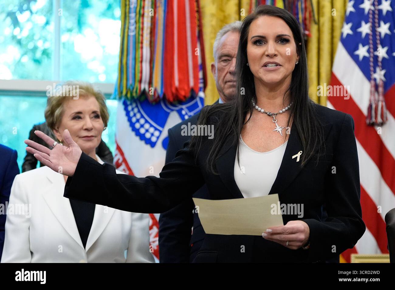 Stephanie McMahon speaks before President Donald Trump signs an ...