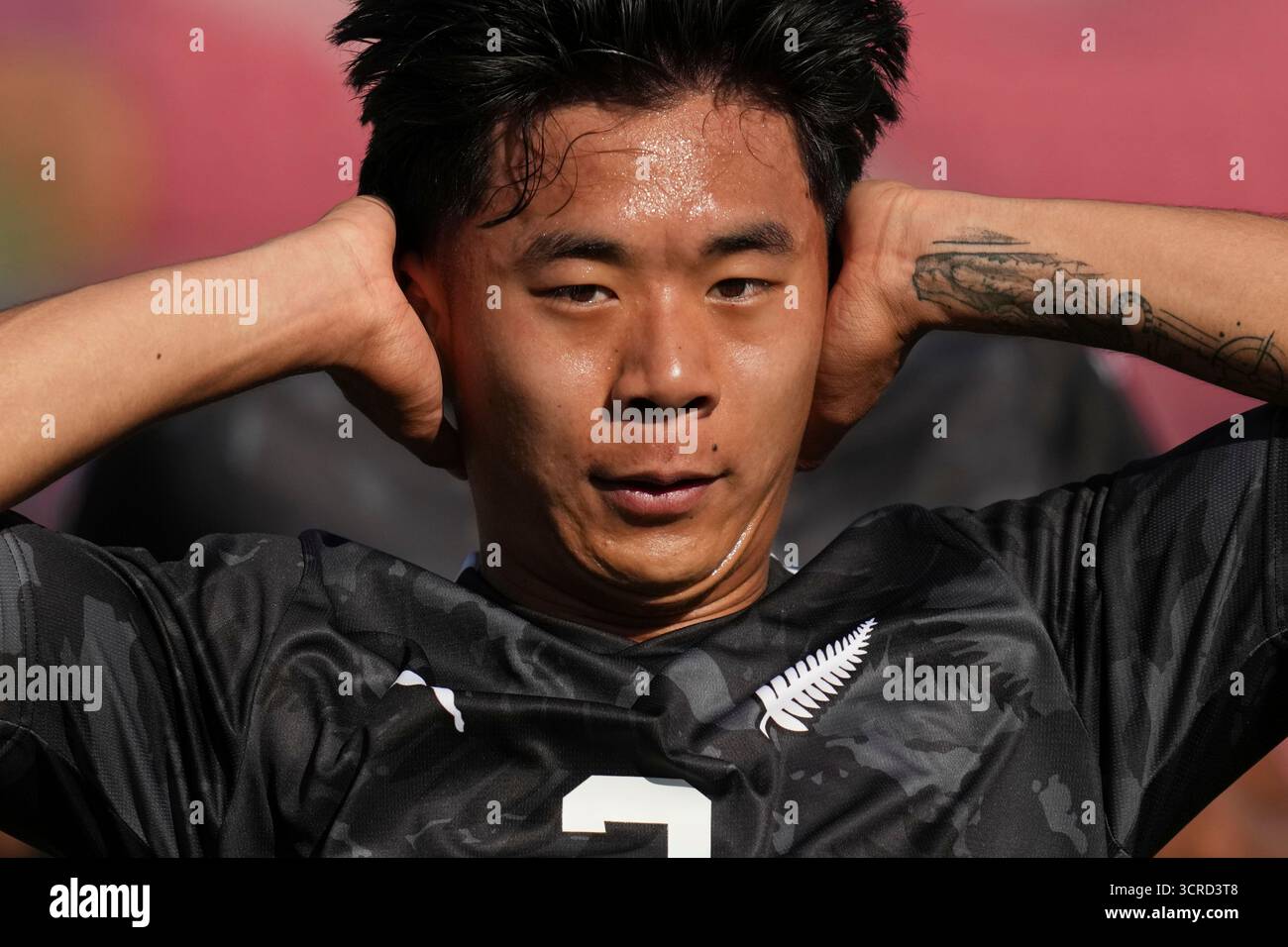 New Zealand's Xuan Loke celebrates scoring his side's second goal ...