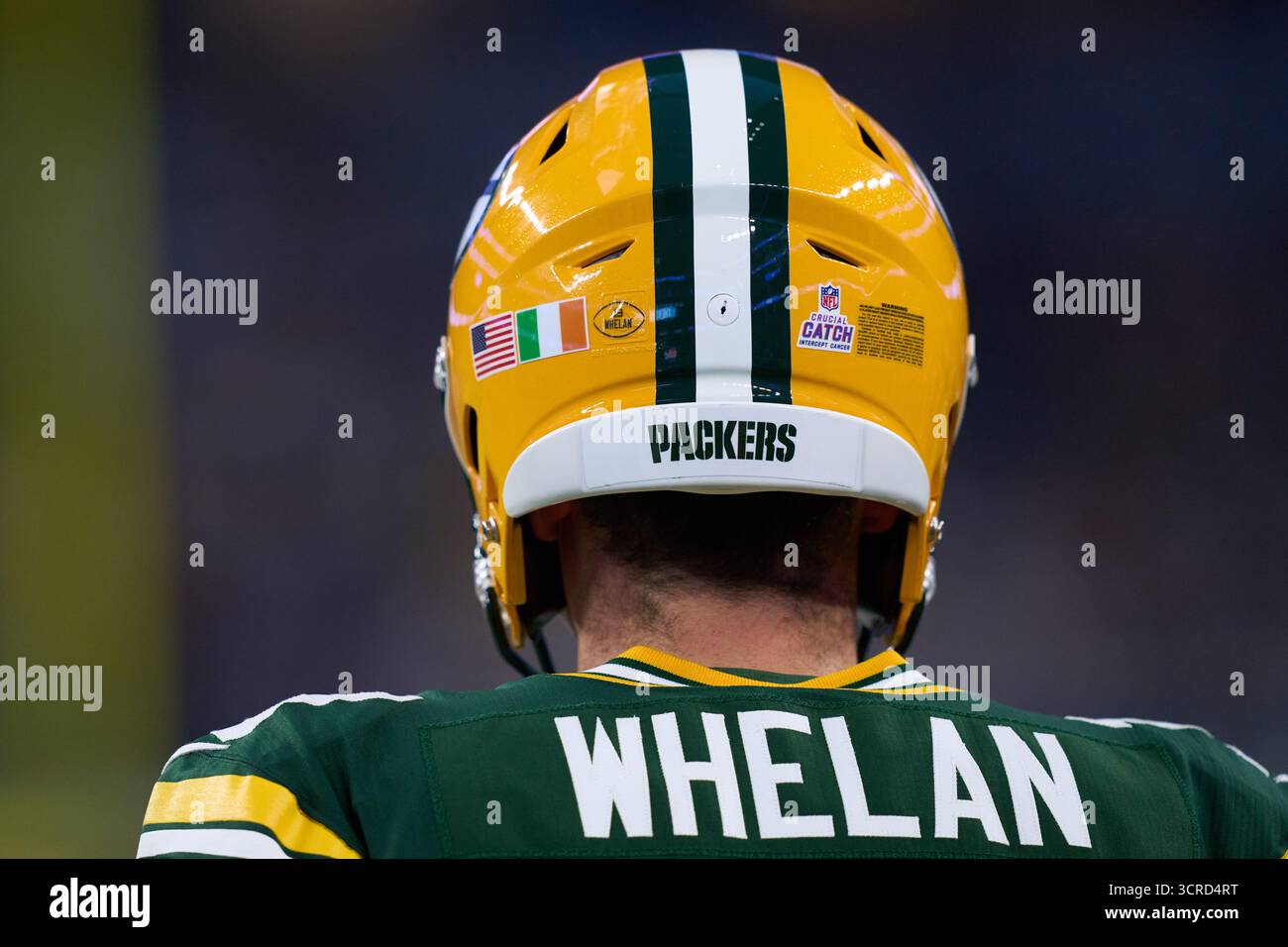 The Irish flag decal is seen on the helmet of Green Bay Packers punter ...