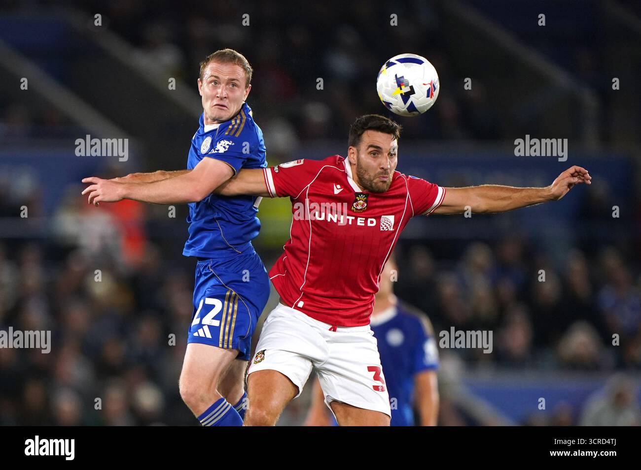 Wrexham's Matthew James battle for the ball with Leicester City's ...