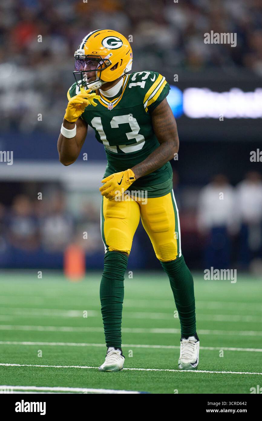 Green Bay Packers wide receiver Dontayvion Wicks (13) lines up for a ...