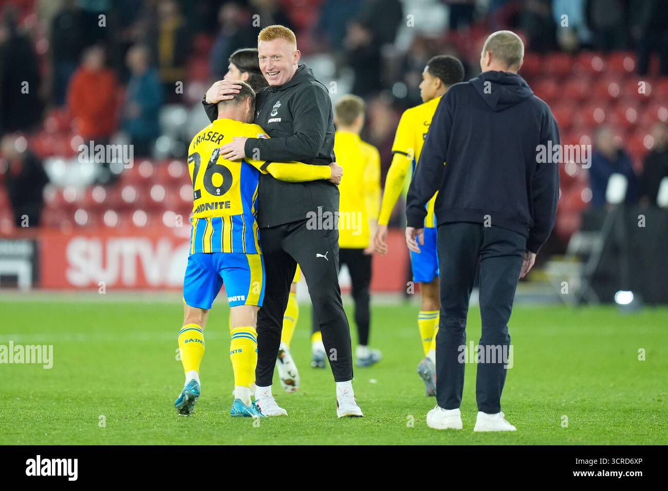 Southampton manager Will Still (centre) celebrates with player Ryan ...