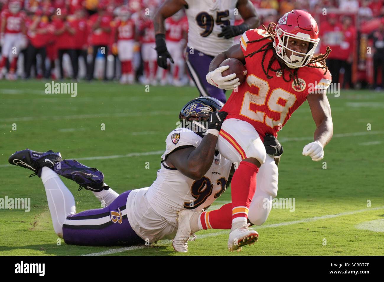 Kansas City Chiefs running back Kareem Hunt (29) gets past Baltimore ...