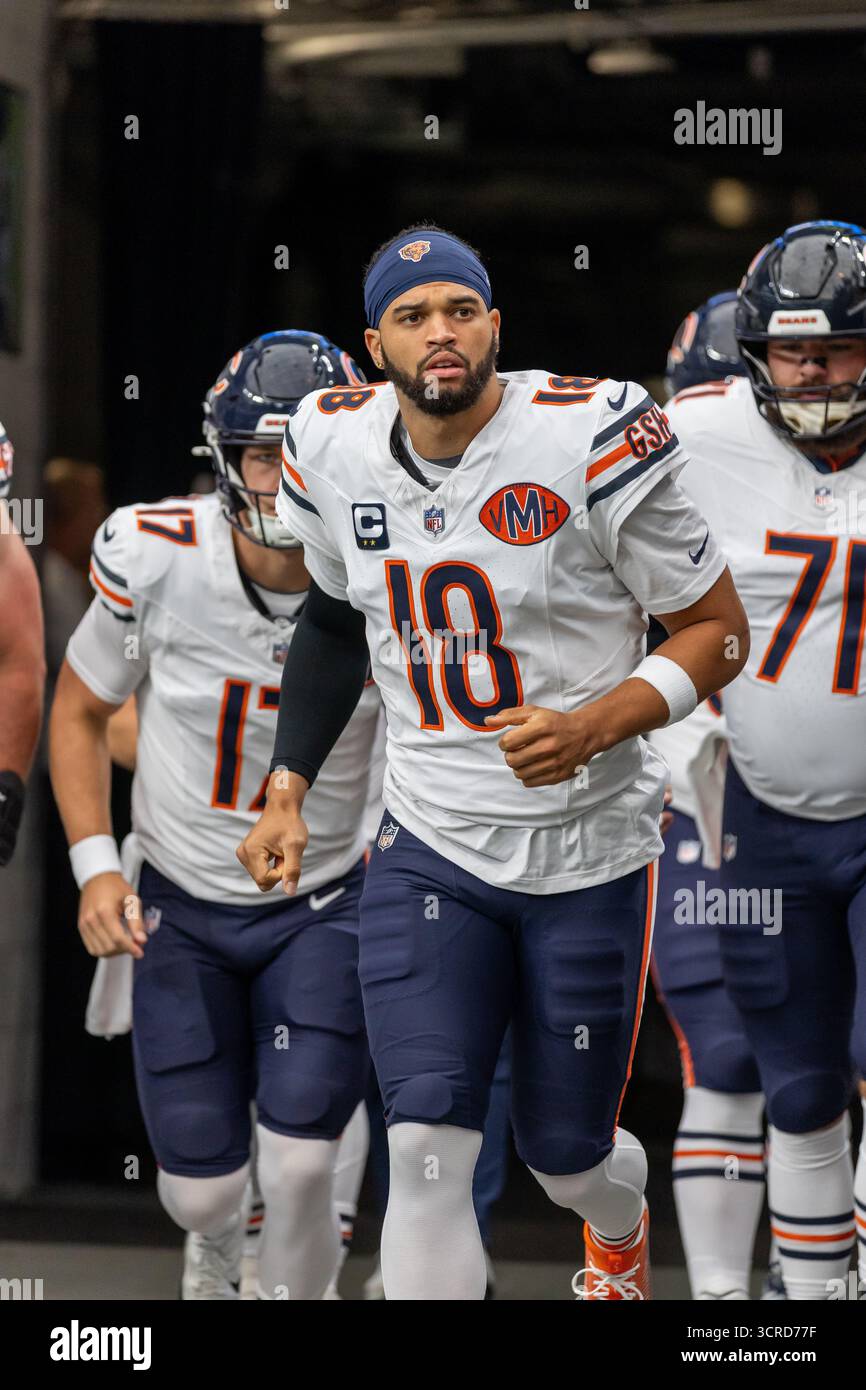 Chicago Bears quarterback Caleb Williams (18) enters the field before ...