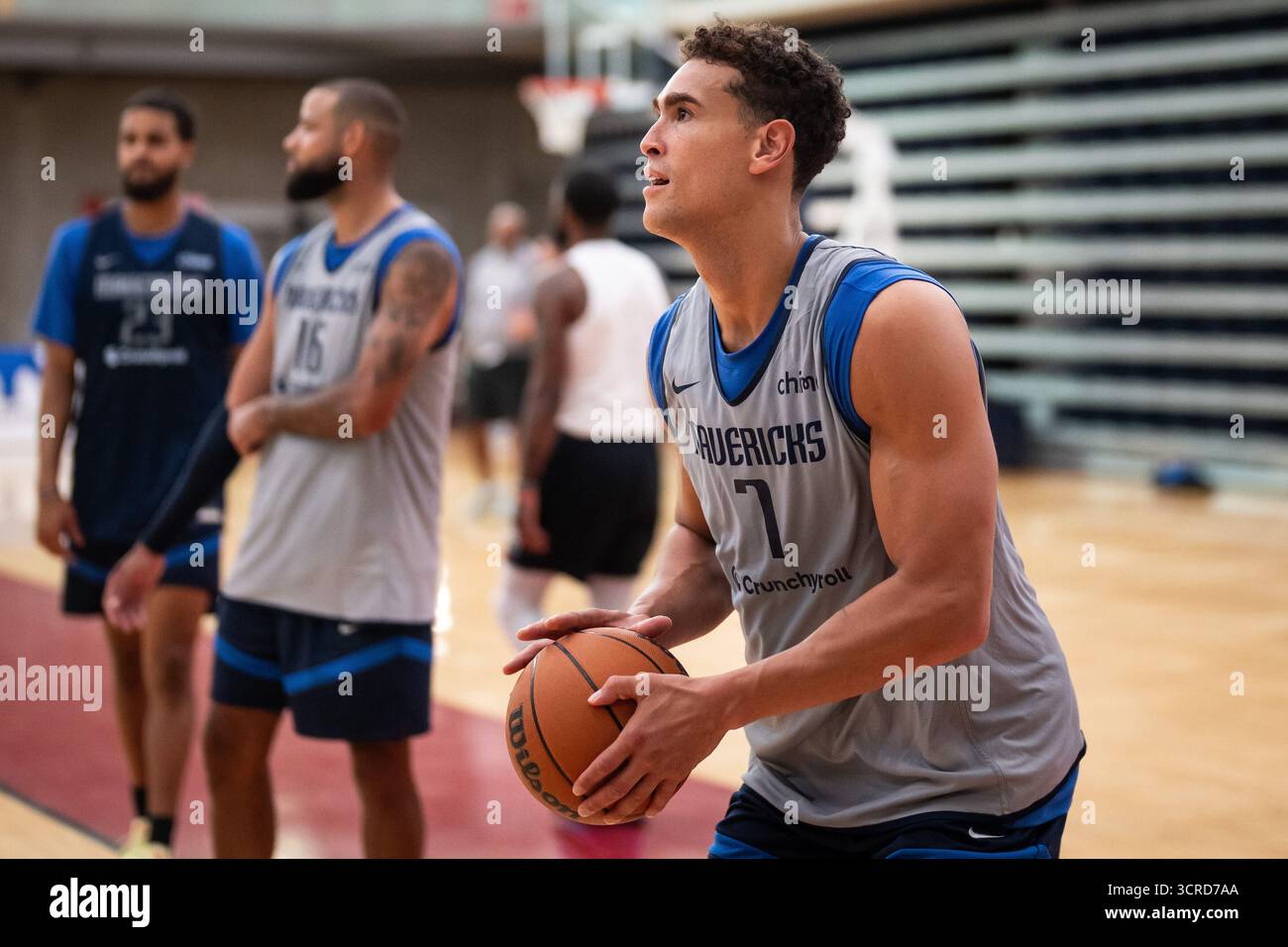 Dallas Mavericks' Dwight Powell shoots during NBA basketball training camp at Simon Fraser ...