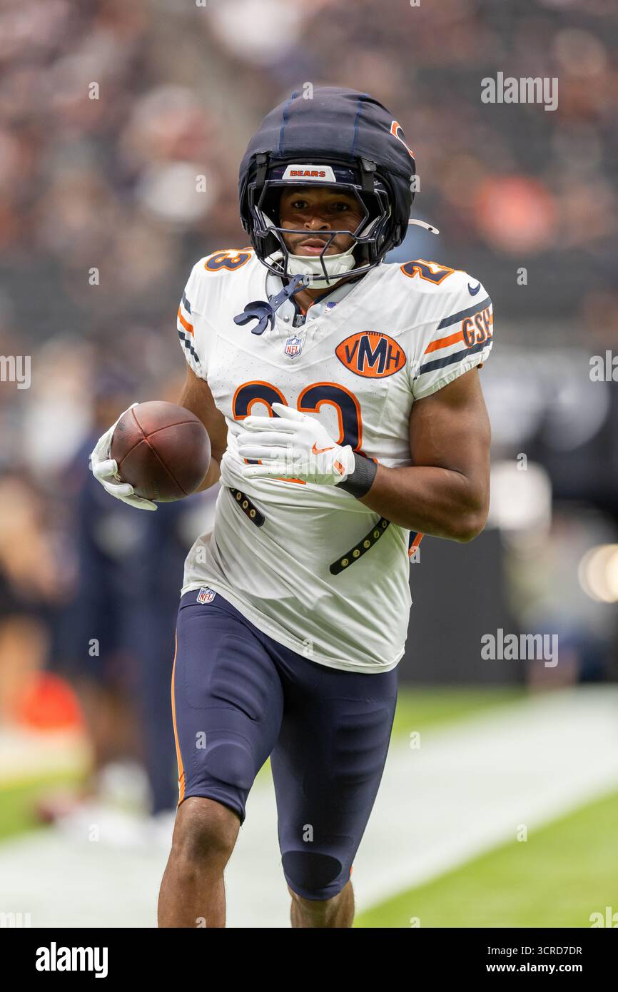 Chicago Bears running back Roschon Johnson (23) warms up before playing ...