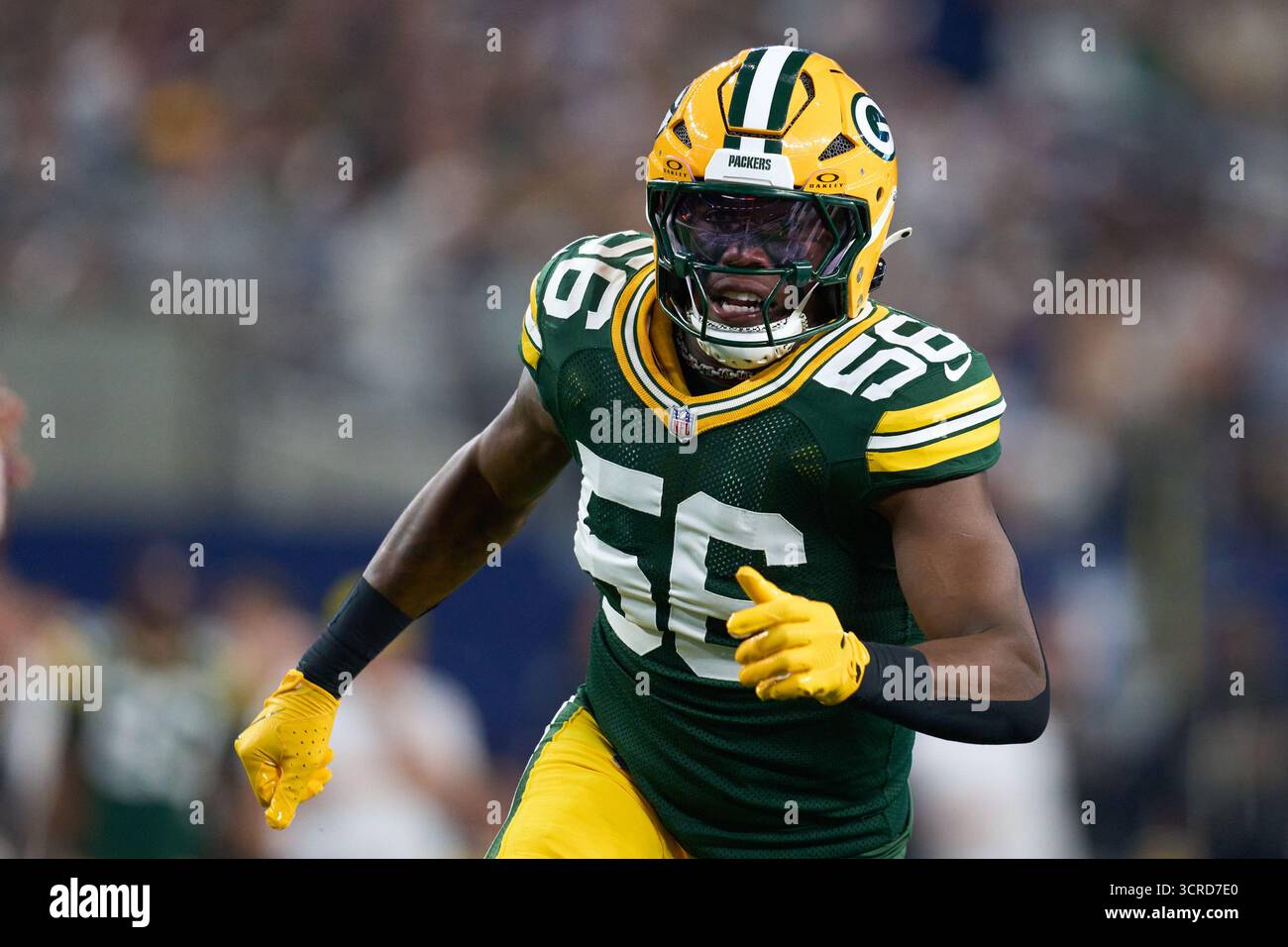 Green Bay Packers linebacker Edgerrin Cooper (56) rushes in during an ...