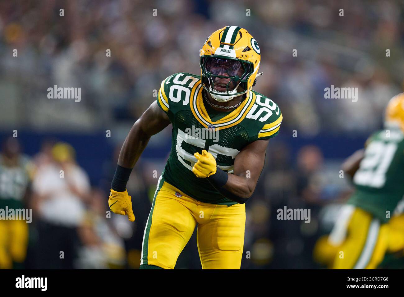 Green Bay Packers linebacker Edgerrin Cooper (56) rushes in during an ...