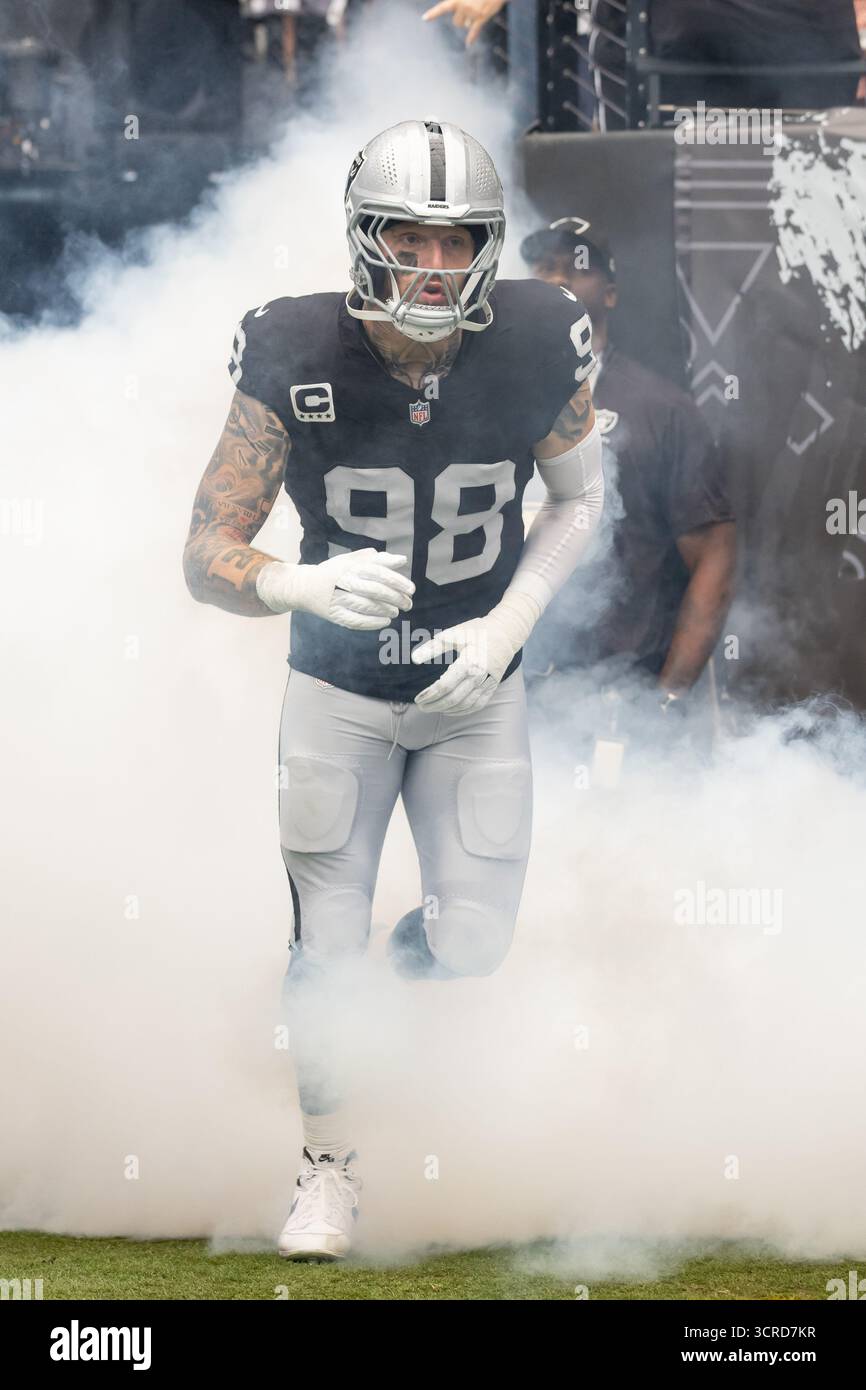 Las Vegas Raiders defensive end Maxx Crosby (98) enters the field ...