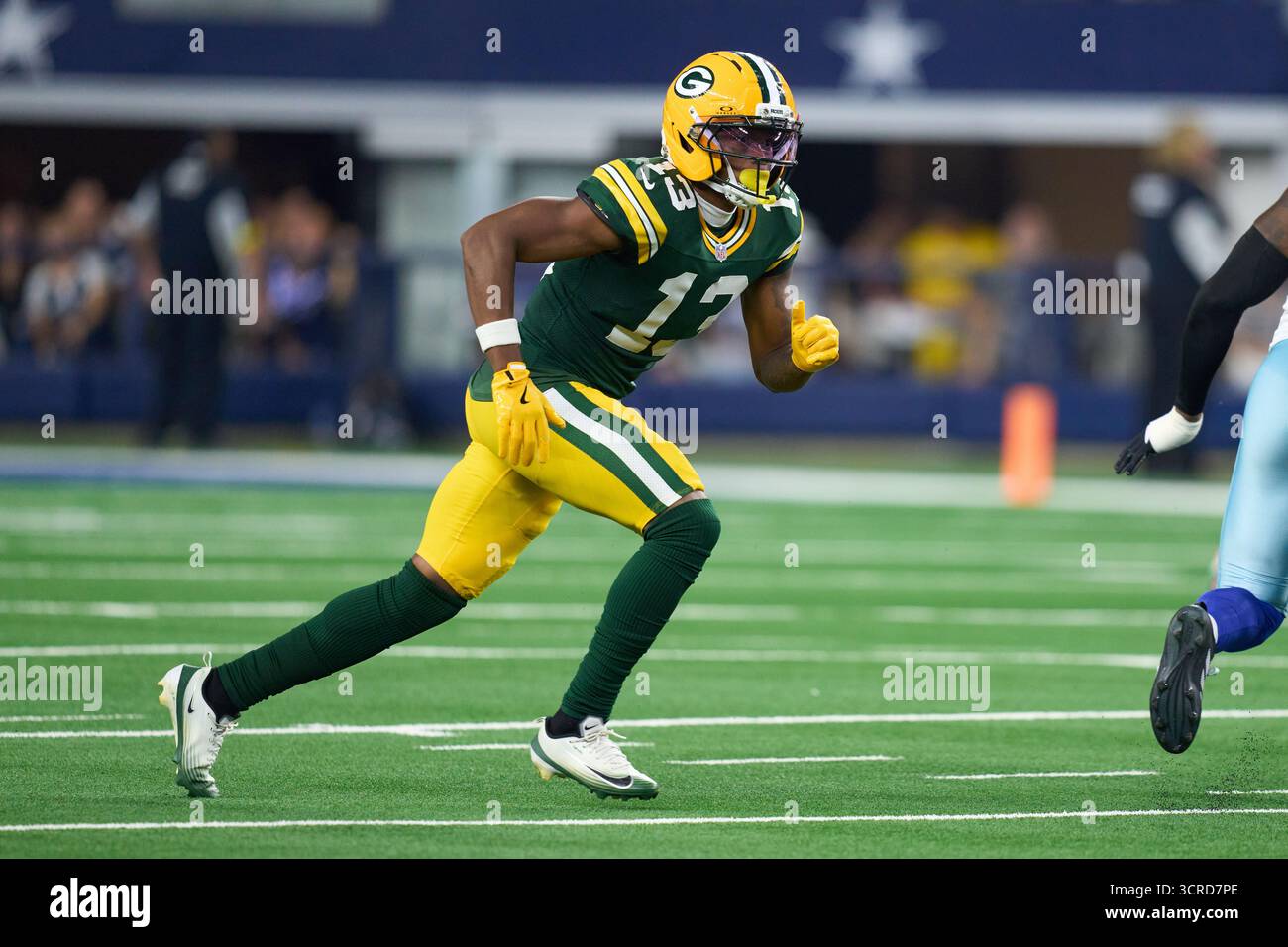 Green Bay Packers wide receiver Dontayvion Wicks (13) runs a route ...