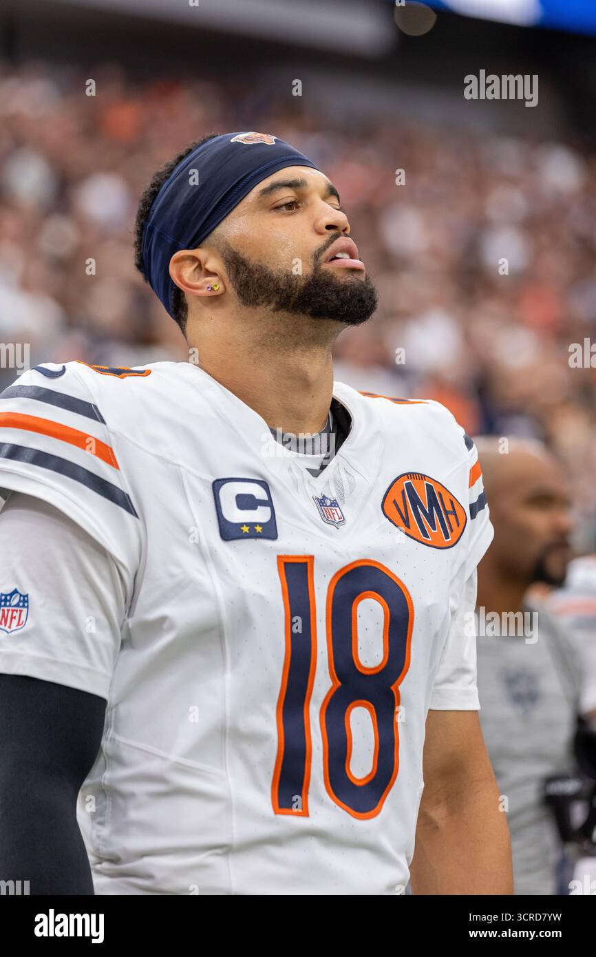 Chicago Bears quarterback Caleb Williams (18) stands for the national ...