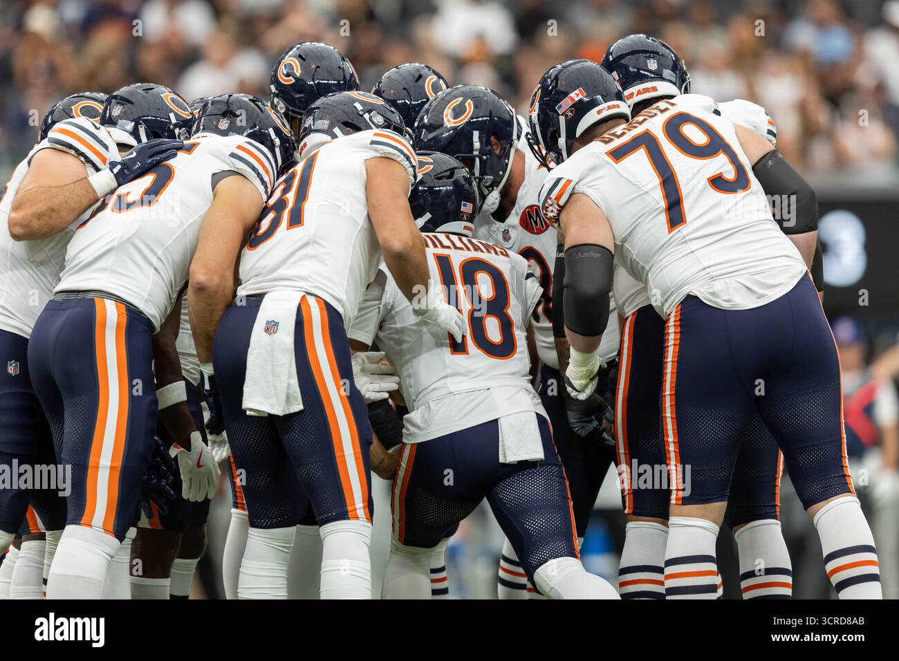 Chicago Bears quarterback Caleb Williams (18) huddles with the offense against the Las Vegas ...