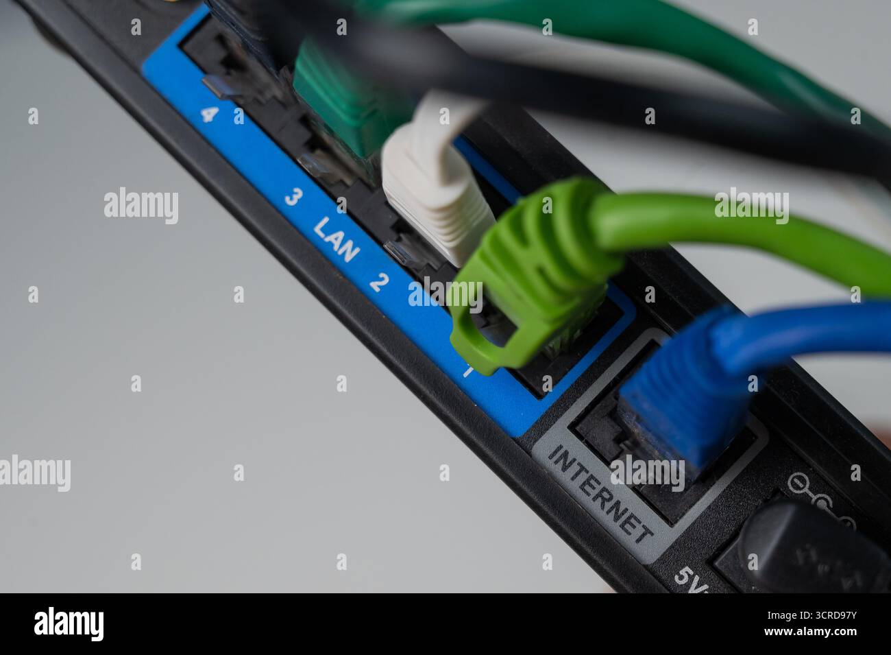 Colorful Ethernet Cables Connected to a Router Stock Photo - Alamy