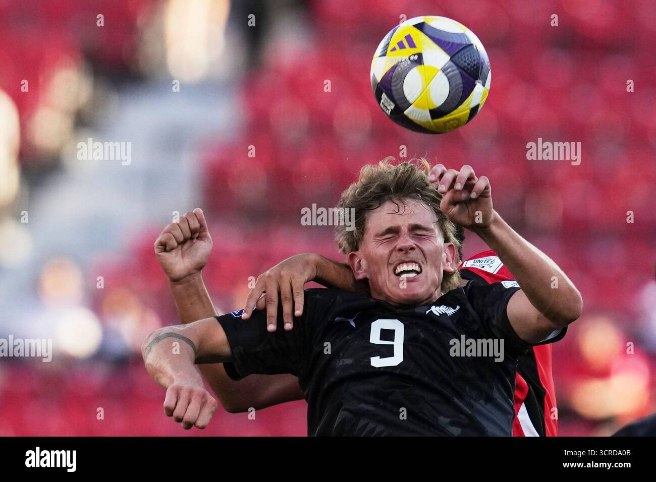 New Zealand's Keegan Kelly (9) and Egypt's Moaataz Mohamed go for a ...