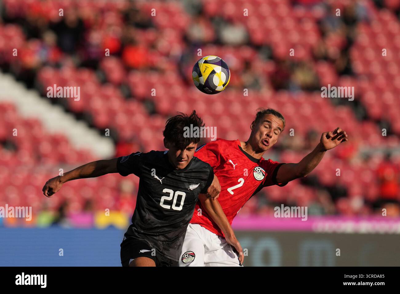 New Zealand's Stipe Ukich (20) and Egypt's Tebo Gabriel battle for the ...