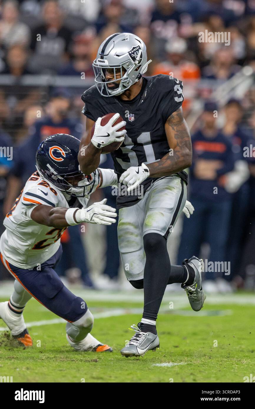 Las Vegas Raiders running back Raheem Mostert (31) runs the ball ...