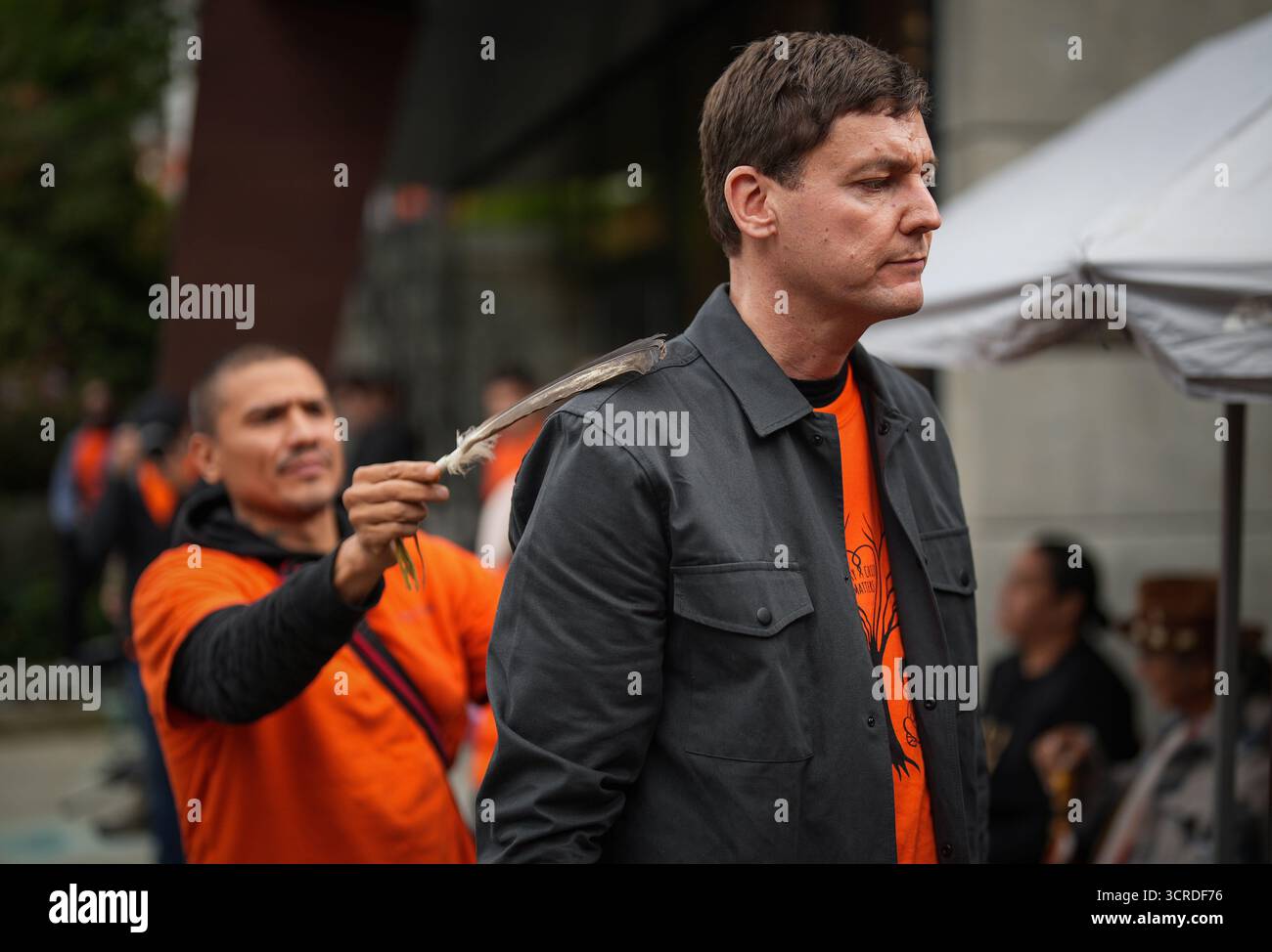 B.C. Premier David Eby is smudged with tobacco by Mitchell Tourangeau ...