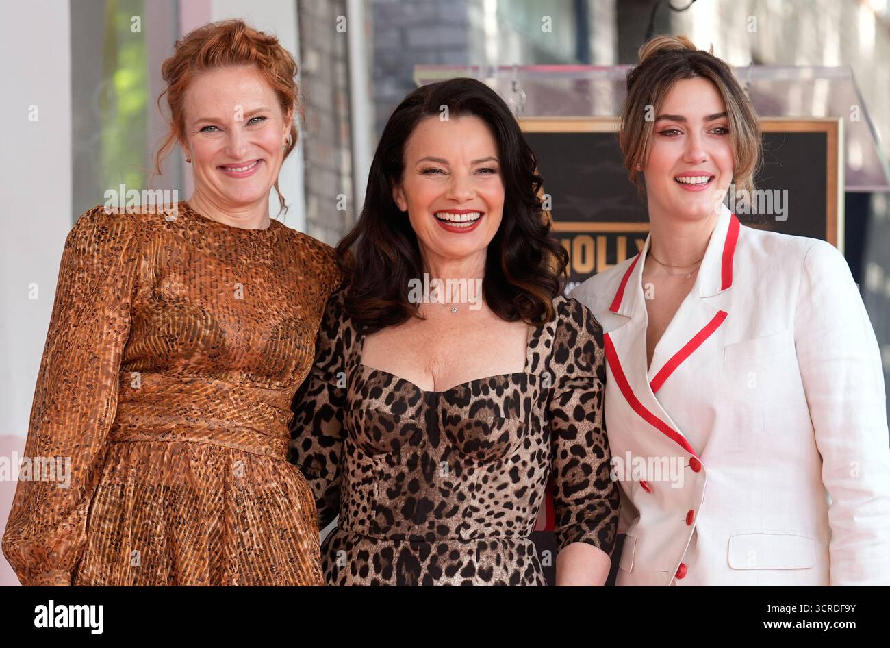 Actor Fran Drescher, center, poses with guest speakers Nicholle Tom ...