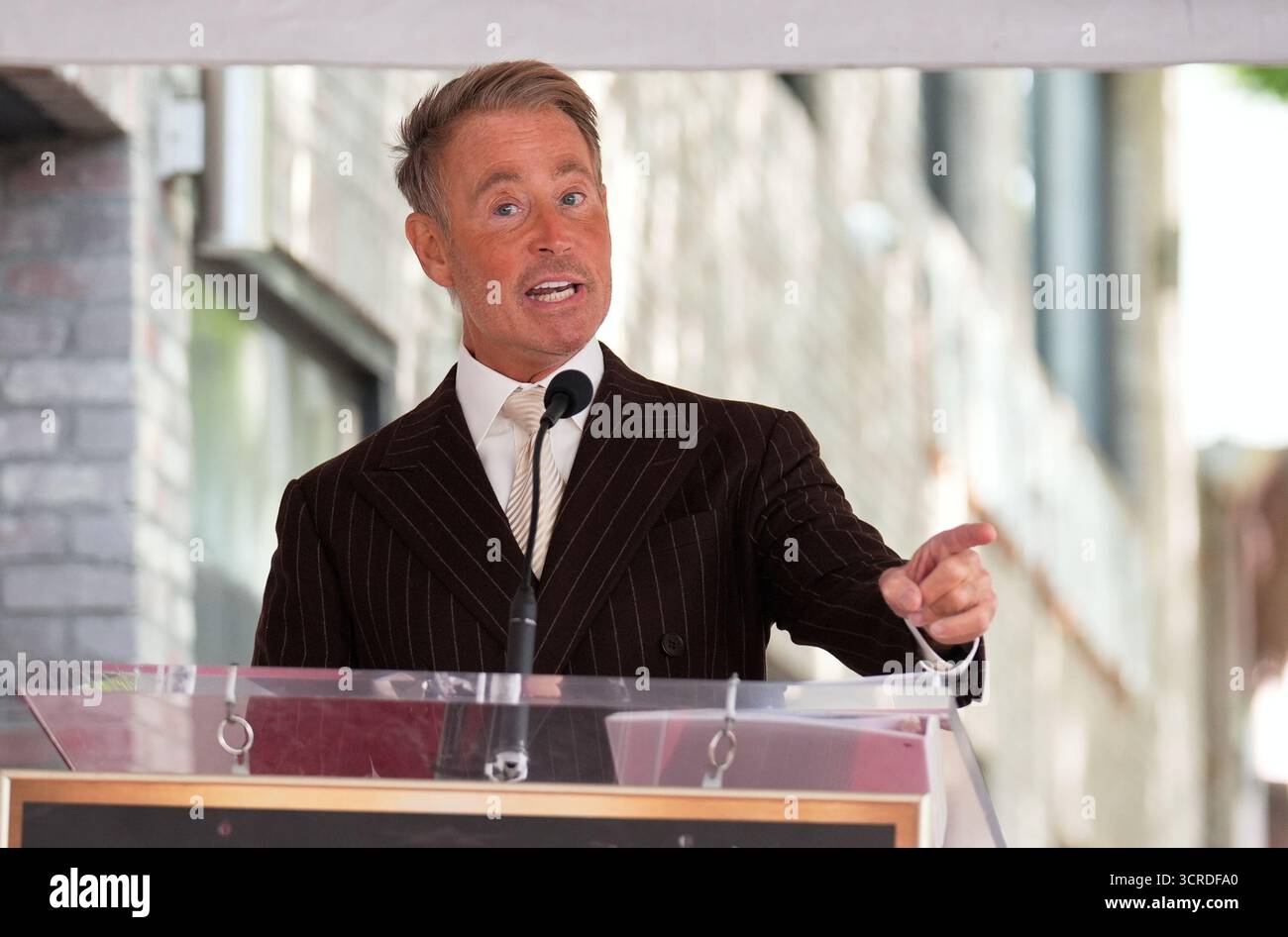 Actor Peter Marc Jacobson speaks during a ceremony to award Fran Drescher a star on the ...
