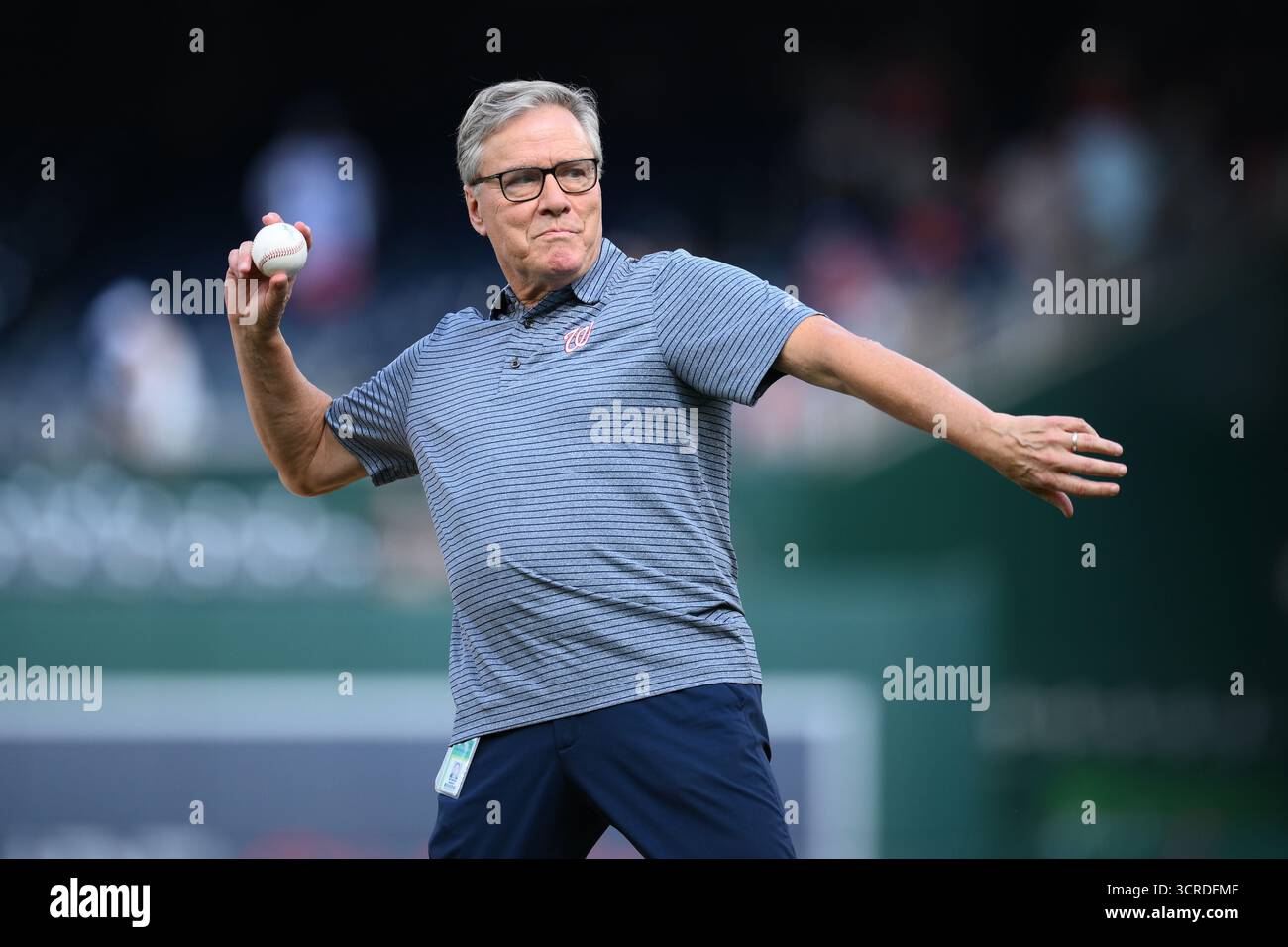 Play-by-play announcer Bob Carpenter throws out the ceremonial first ...