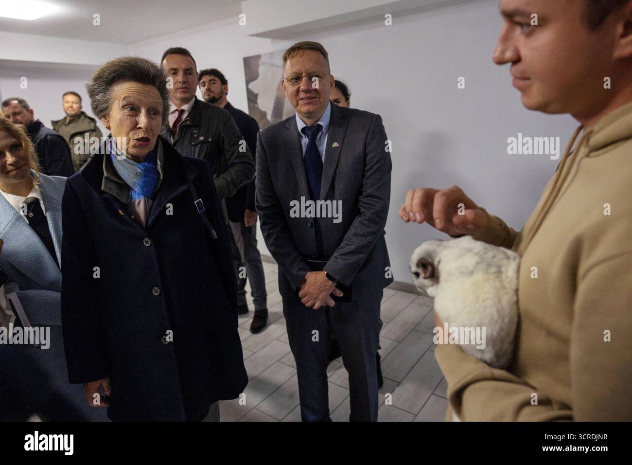Britain's Princess Anne meets a Ukrainian veteran during his animal ...