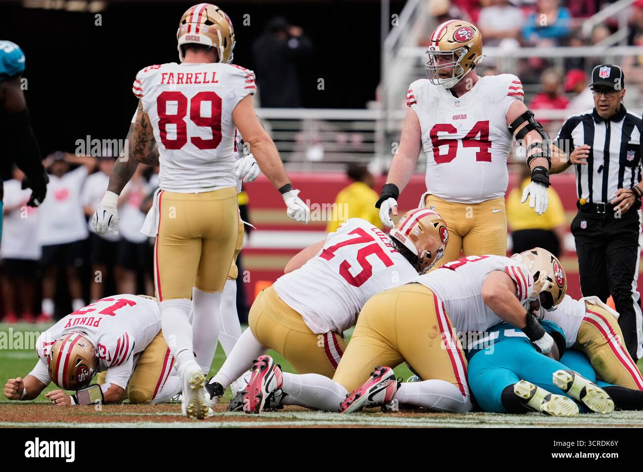 San Francisco 49ers quarterback Brock Purdy (13) reacts after fumbling ...