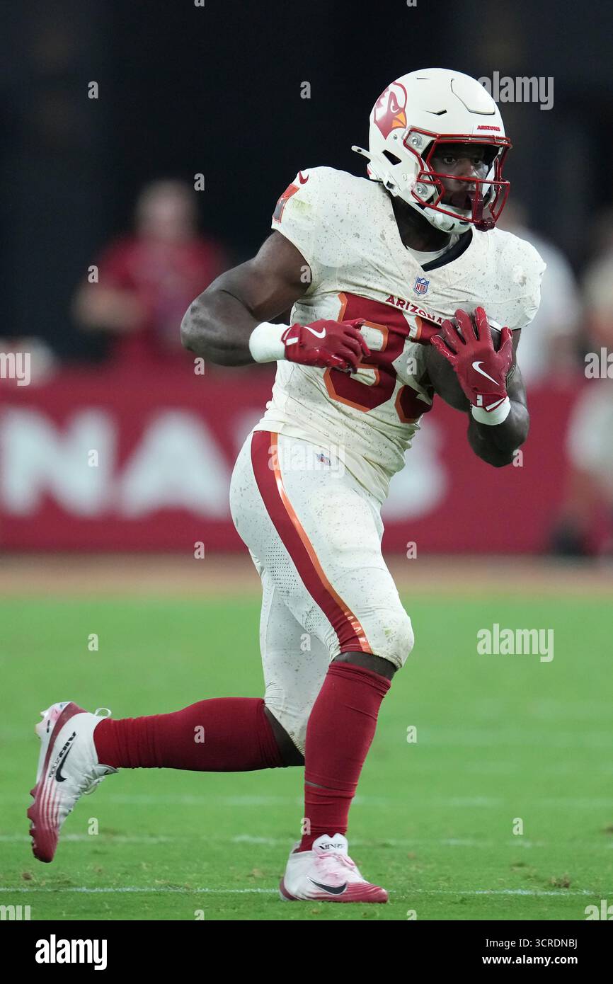 Arizona Cardinals running back Trey Benson runs against the Seattle ...