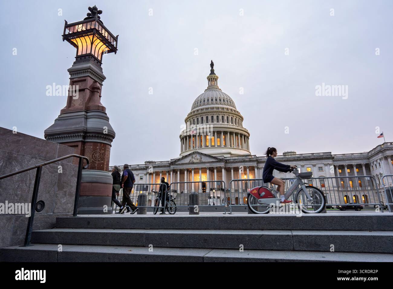 The Capitol is seen at dusk as Democrats and Republicans in Congress ...