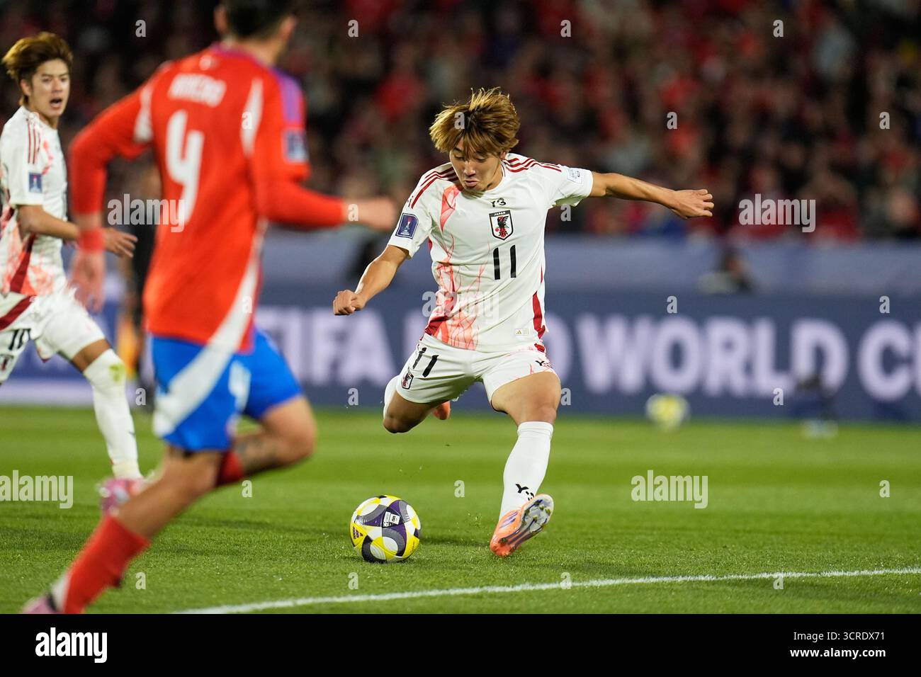 Japan's Yumeki Yokoyama, right, scores his side's 2nd goal against ...