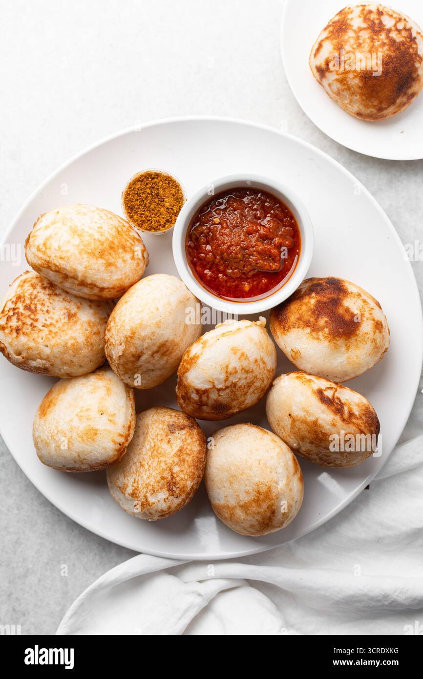 Overhead view of a plate of masa and pepper sauce, top view of food ...