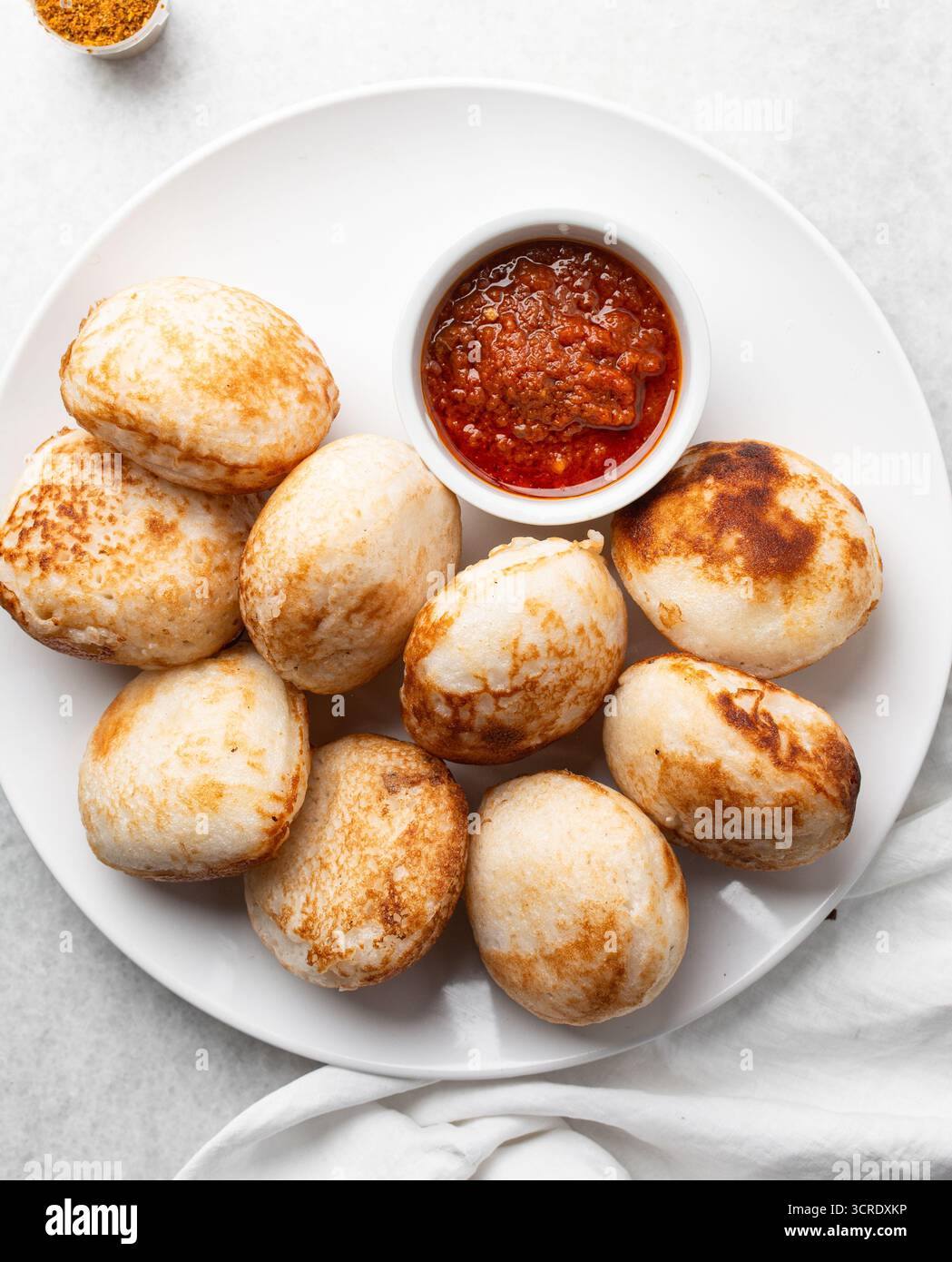 Overhead view of a plate of masa and pepper sauce, top view of food ...