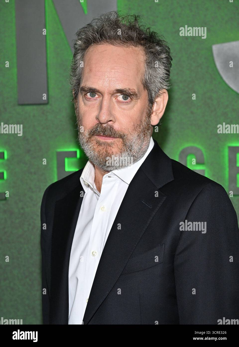 Tom Hollander attends the world premiere of Netflix's "Monster: The Ed ...