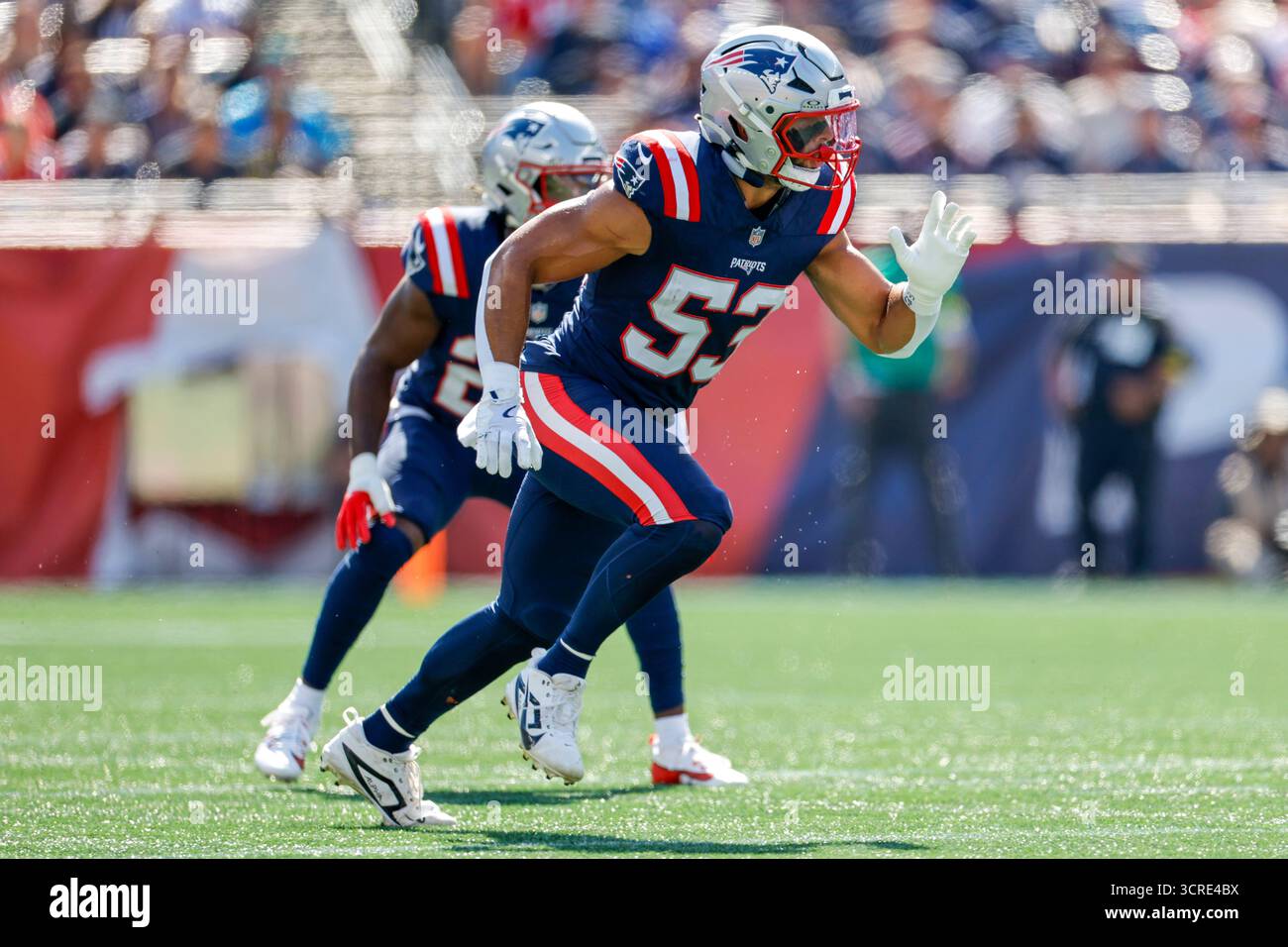 New England Patriots linebacker Christian Elliss (53) rushes during the ...