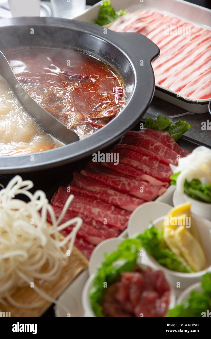 A view of all the elements of a hot pot meal Stock Photo - Alamy