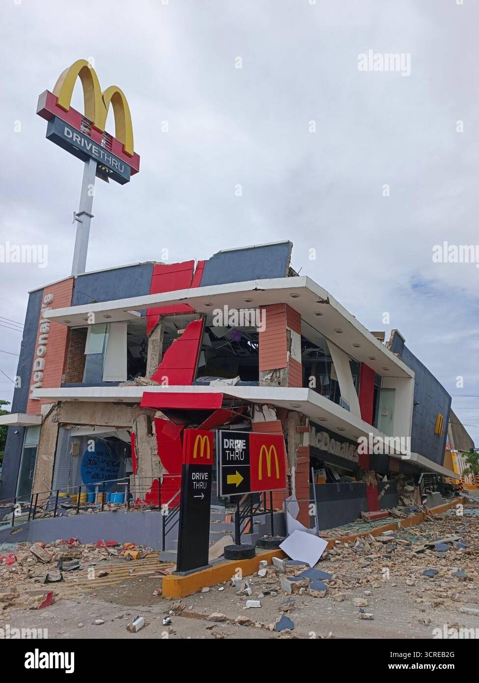 A damaged McDonald's store is seen in Bogo City, Cebu province ...