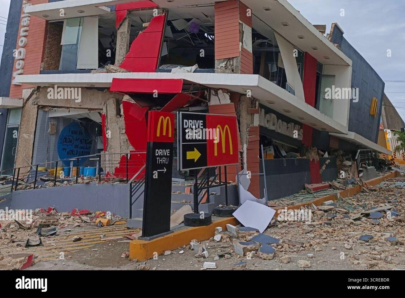 A damaged McDonald's store is seen in Bogo City, Cebu province ...