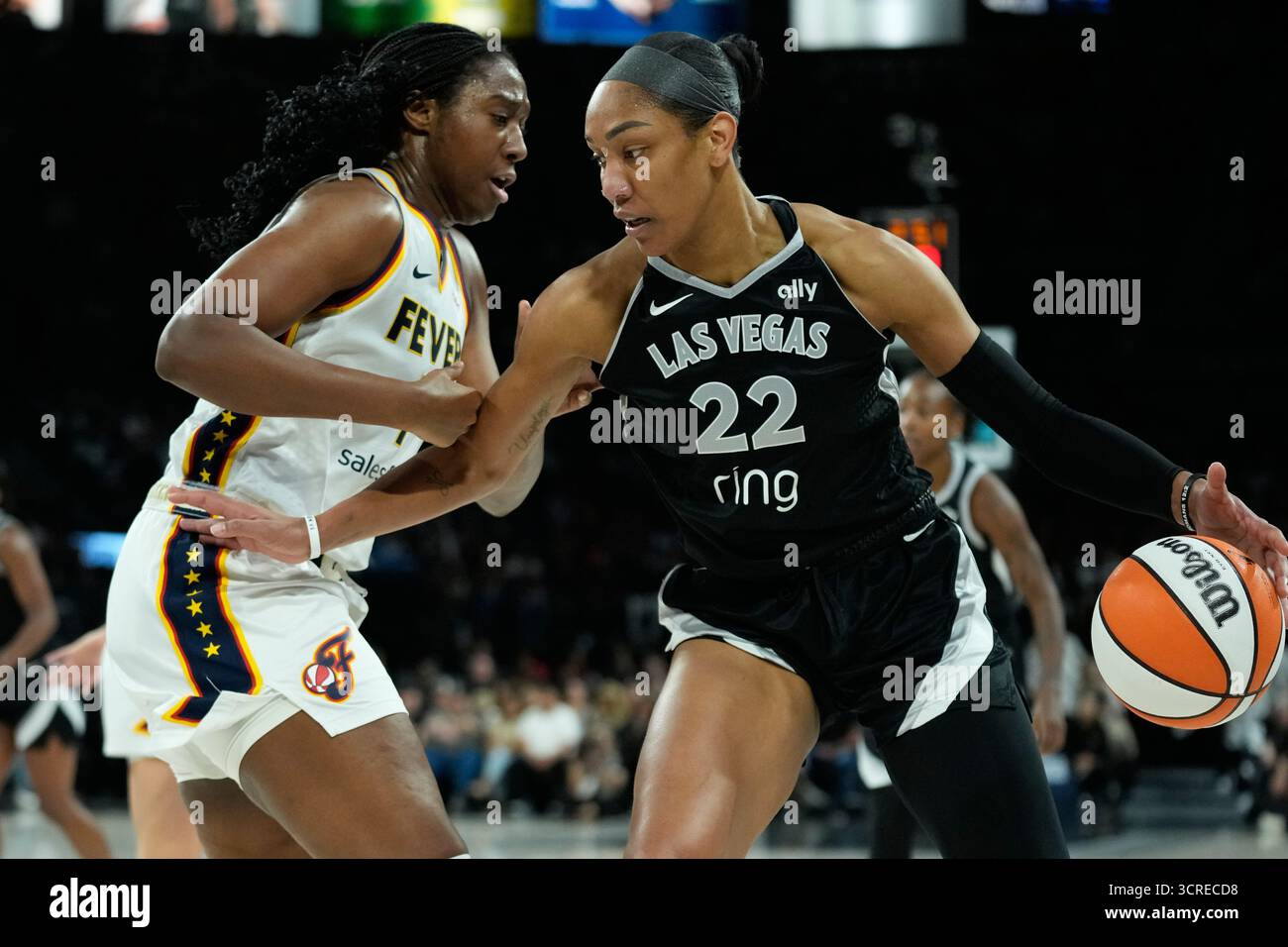 Las Vegas Aces center A'ja Wilson (22) drives against Indiana Fever ...
