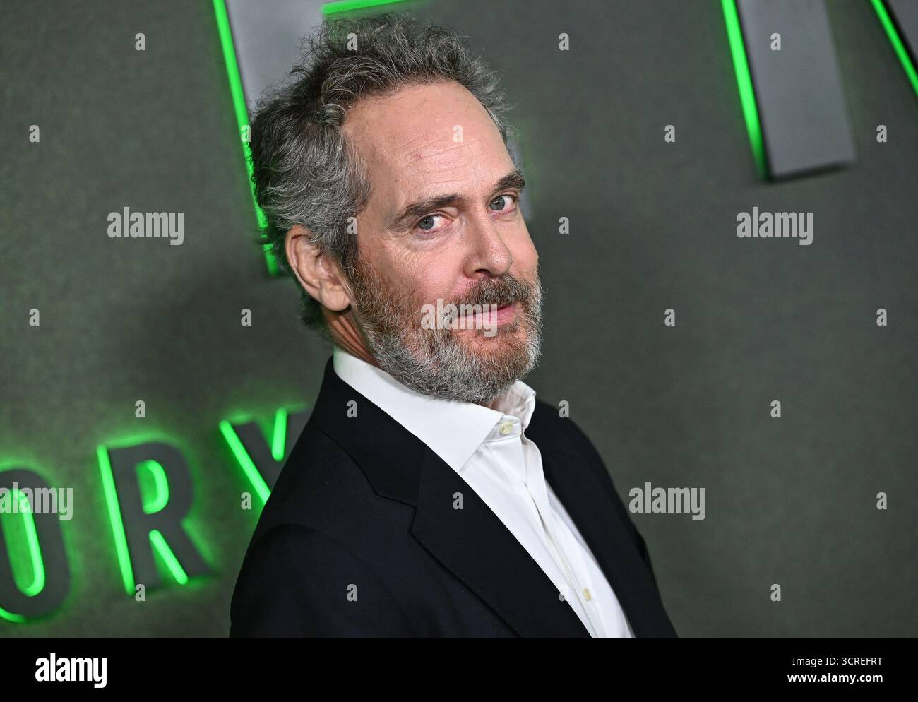 Tom Hollander attends the world premiere of Netflix's "Monster: The Ed ...